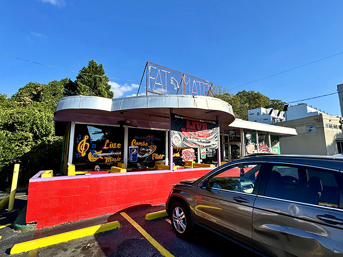 That neon sign isn't just a logo—it's Atlanta's bat signal for barbecue lovers. Fat Matt's glows like a beacon of smoky promise.v