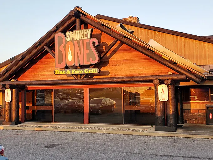 The golden-hour glow on this rustic wooden facade isn't just good lighting—it's nature's way of saying "barbecue happens here."