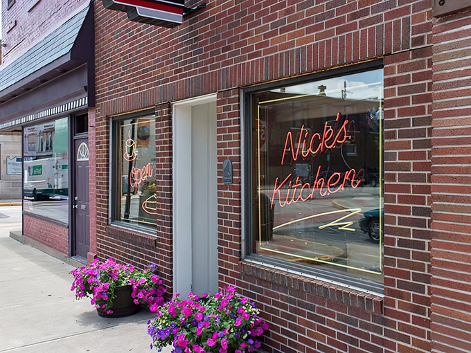 That iconic neon sign isn't just advertising – it's a beacon of hope for hungry travelers seeking breakfast nirvana in downtown Huntington.