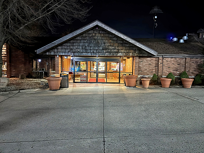 The rustic wooden shingles and warm brick exterior welcome hungry travelers like an old friend waiting with open arms.