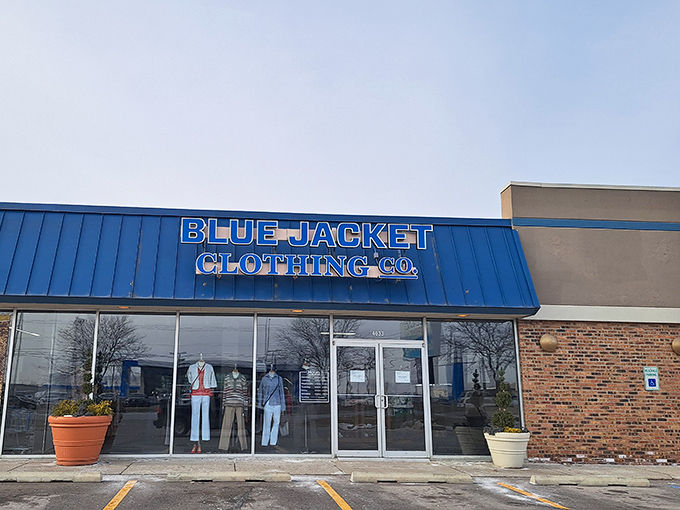 The blue awning of Blue Jacket Clothing Co. beckons like a fashion oasis in Fort Wayne, promising treasures that won't break the bank.