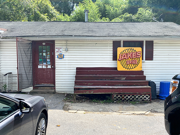 The unassuming exterior of Jake's Grill proves once again that in BBQ, appearances are deliciously deceiving. The best smokehouses often look like this—humble on the outside, heavenly on the inside.