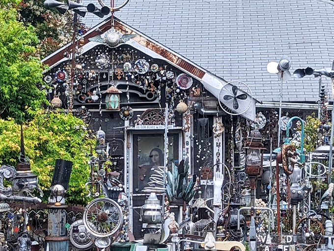 The front facade of Vanadu Art House looks like what would happen if a hardware store and a carnival had a baby that went to art school.