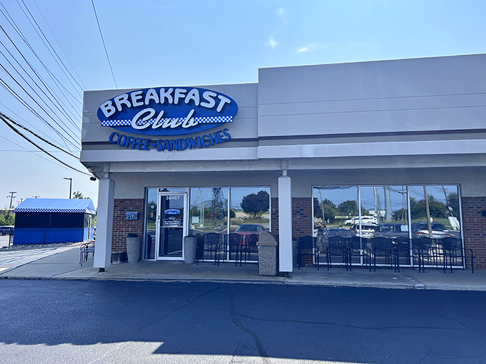 The blue and white checkerboard sign beckons like an old friend. No fancy frills needed when breakfast perfection awaits inside.