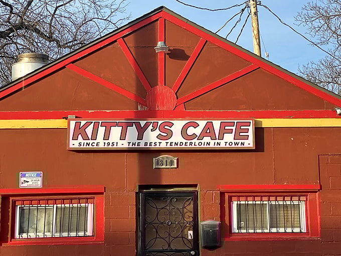 The unmistakable red facade of Kitty's Cafe has been Kansas City's north star for tenderloin pilgrims since 1951. Some landmarks need neon; this one just needs that sign.