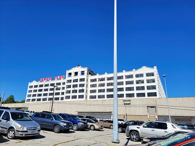 The iconic Super Flea entrance beckons bargain hunters with its no-frills charm and cartoon mascot—like a siren call for treasure seekers everywhere.