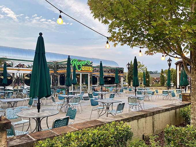 The outdoor patio at Roger's Diner feels like summer vacation incarnate – complete with string lights that promise evening magic under North Carolina skies.