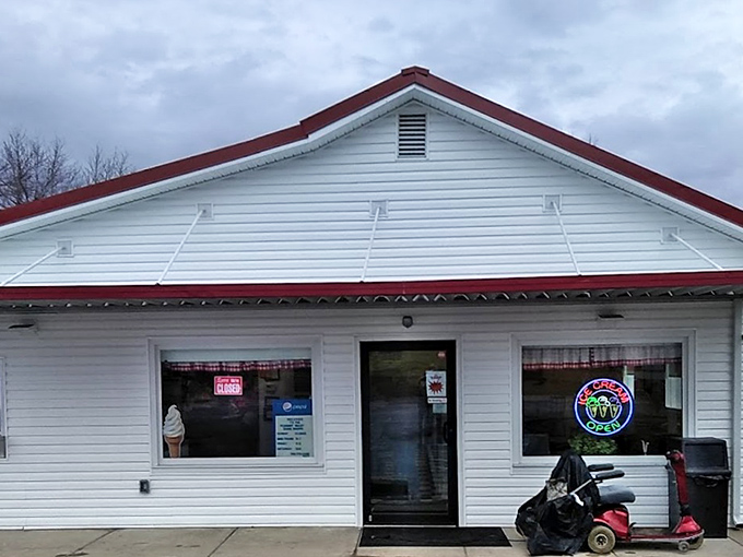 The unassuming white clapboard building with its cheerful red roof stands like a time capsule of Americana, promising sweet relief from Ohio summers.