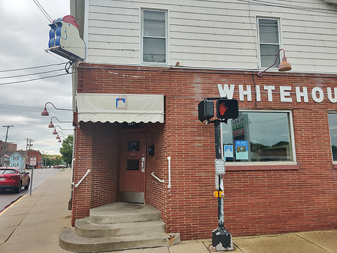 The unassuming brick exterior of White House Chicken holds no pretense – just the promise of Barberton's finest poultry legacy waiting inside that humble doorway.