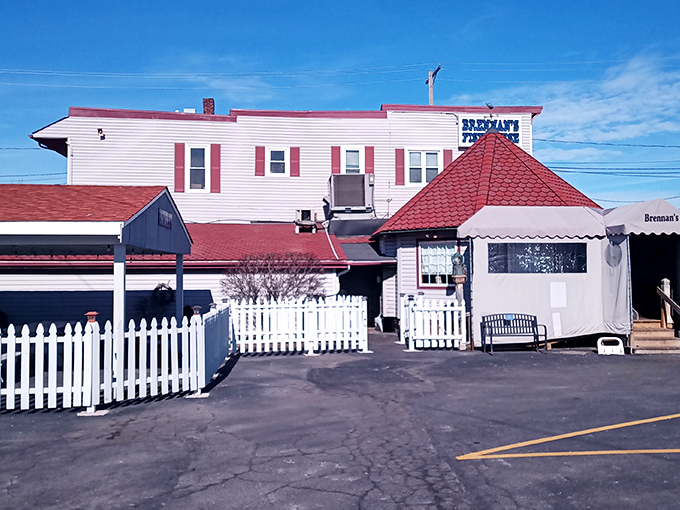 The white picket fence isn't just charming decor—it's holding back the crowds who've caught wind of Grand River's seafood sanctuary.