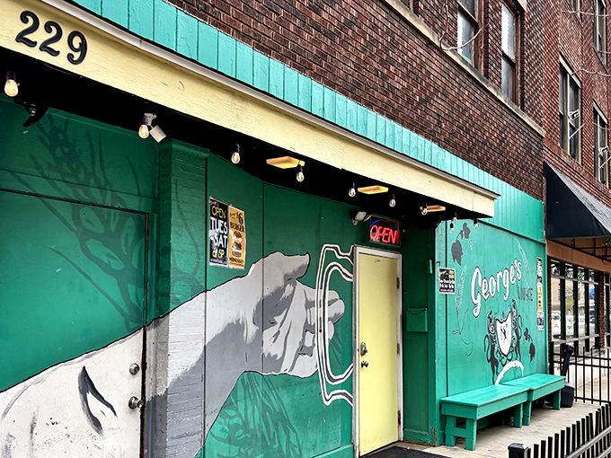The unmistakable green facade of George's Lounge stands out on Cleveland Avenue like a culinary lighthouse guiding hungry travelers to burger paradise.