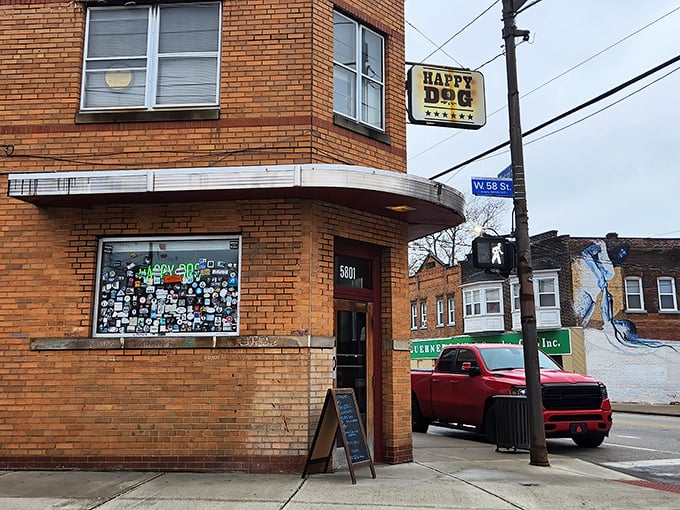 The unassuming brick corner building houses culinary magic within. Like Clark Kent's phone booth, this humble exterior transforms ordinary hot dogs into superheroes of flavor.