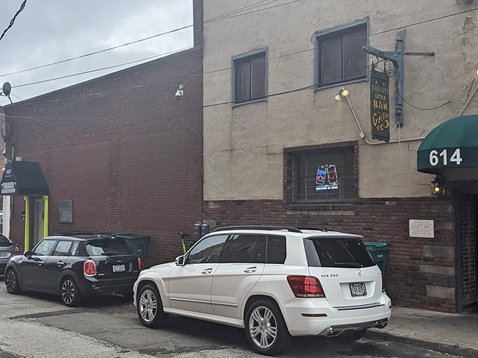 The unassuming entrance to Johnny's Little Bar might be Cleveland's best-kept secret. That green awning marks the spot where burger dreams come true.