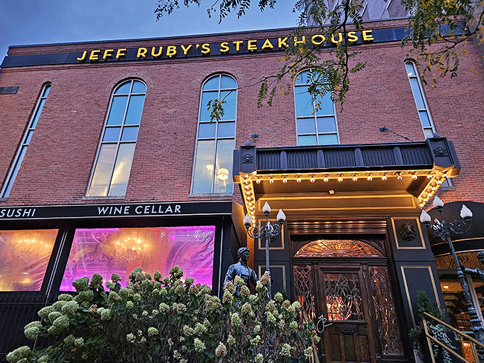 The grand entrance says it all – those lion sentinels aren't just guarding the door, they're protecting Columbus's temple of beef excellence.