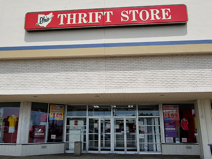 The iconic red and white Ohio Thrift Store sign promises treasure hunting adventures that won't break the bank—retail therapy with prices from a gentler era.