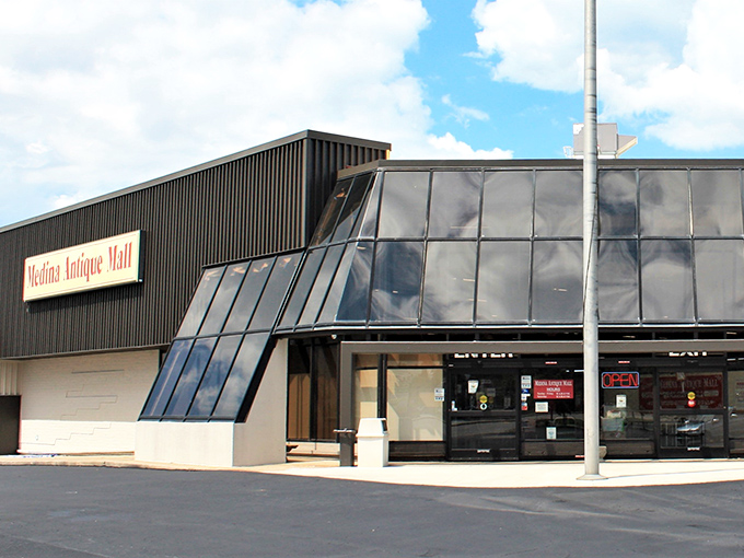 The unassuming exterior of Medina Antique Mall hides a universe of treasures inside, like finding the Tardis of vintage collectibles in Ohio.