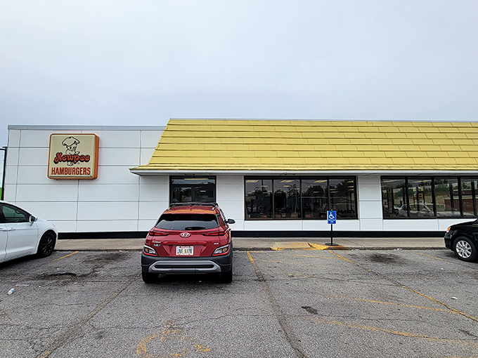 That iconic yellow roof and cheerful signage isn't just architecture—it's a beacon of burger bliss calling you home to Lima.