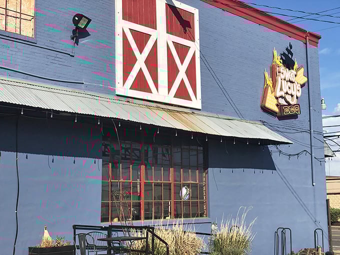 The barn-red door and blue exterior of Sweet Lucy's isn't shouting for attention—it's too busy perfecting what's smoking inside.
