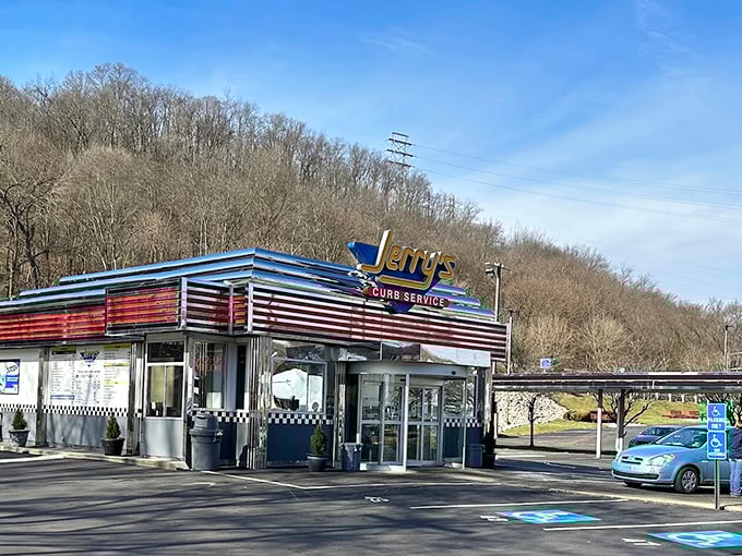 The gleaming chrome and red stripes of Jerry's Curb Service stand as a shining beacon of burger paradise against the Pennsylvania hills.