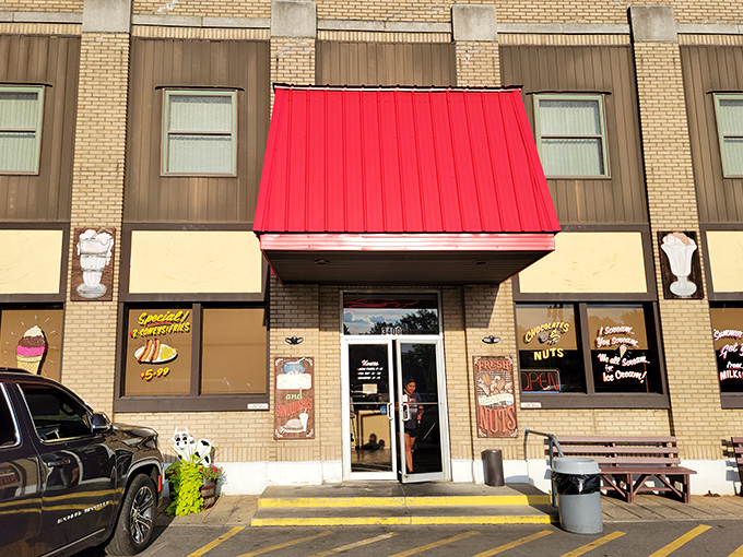 The bright red awning of Milk and Honey beckons like a lighthouse for the sweet-toothed traveler, promising nostalgic delights within those brick walls.