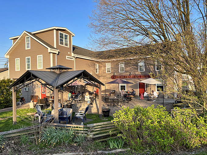 The unassuming exterior of Hublersburg Inn stands like a culinary speakeasy – no flashy signs needed when the food does all the talking.