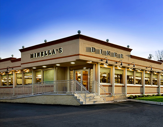 The classic exterior of Minella's Diner stands like a beacon of breakfast hope against the Pennsylvania sky, promising comfort food salvation to all who enter.