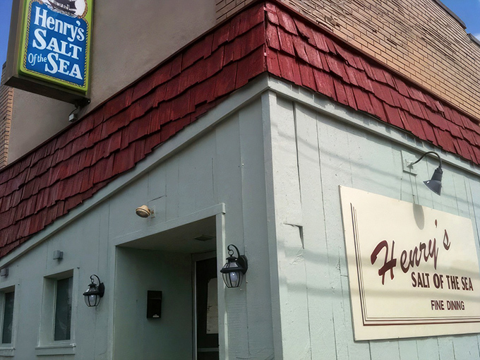 Don't let the modest exterior fool you—Henry's Salt of the Sea hides seafood treasures behind that unassuming façade and weathered red shingles.