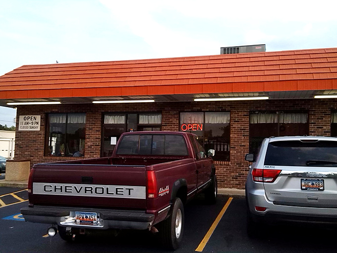 That iconic red roof and brick exterior isn't trying to be fancy—and that's precisely its charm. A beacon for hungry travelers since long before Instagram food pics were a thing.