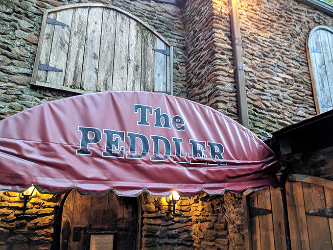 Like stumbling upon a secret cottage in an enchanted forest, The Peddler's stone exterior promises culinary magic within those rustic walls.
