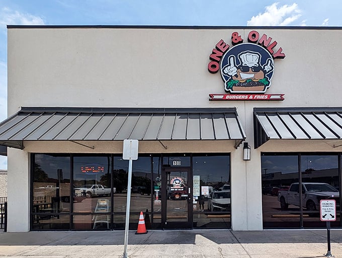 The unassuming storefront might not stop traffic, but that cartoon chef with sunglasses knows something you don't yet – burger nirvana awaits inside.