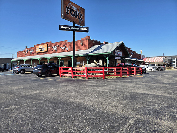 The rustic wooden exterior of Caney Fork beckons with its "Really GOOD FOOD" promise and distinctive red fence – like a frontier outpost for hungry explorers.