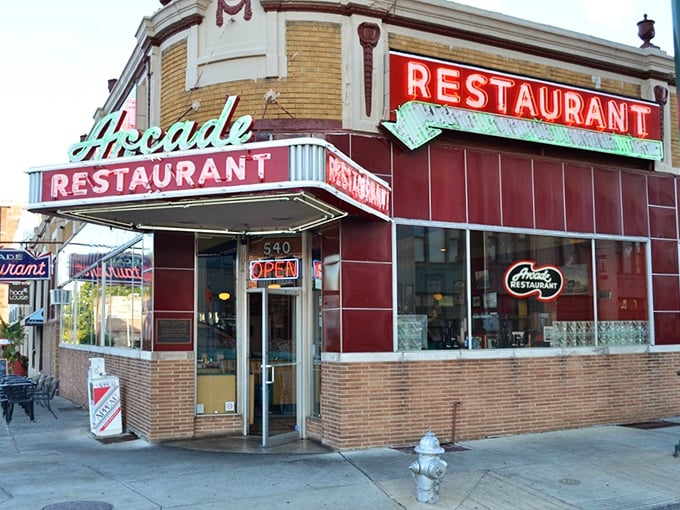 That mint green script against classic red tile isn't just a sign—it's a time machine disguised as Memphis's oldest café. Some neon just speaks to your soul.
