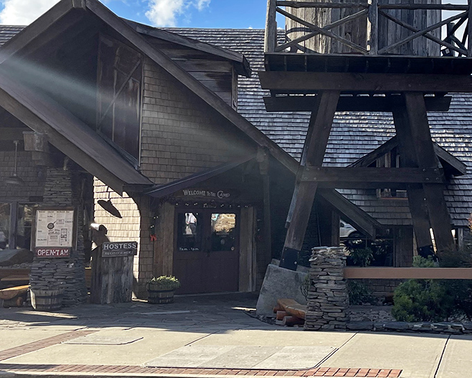 The frontier fantasy begins before you even step inside—that water tower and log cabin exterior promise breakfast adventures worthy of Davy Crockett himself.