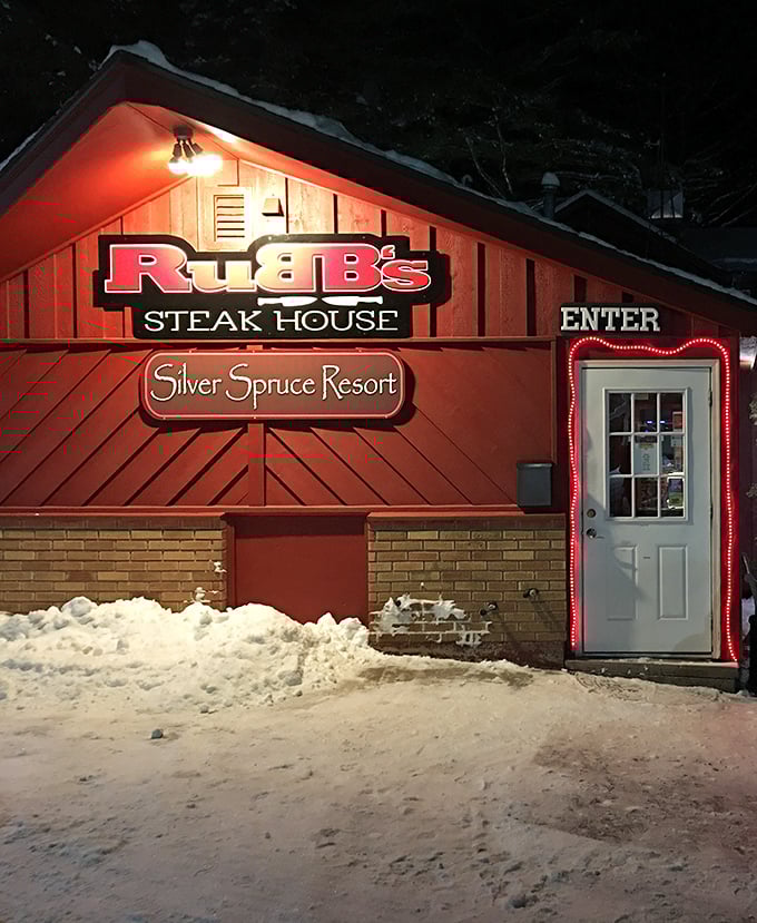 Nestled among towering pines, Rubb's rustic red exterior promises the kind of authentic Wisconsin dining experience that makes you forget about your diet resolutions.