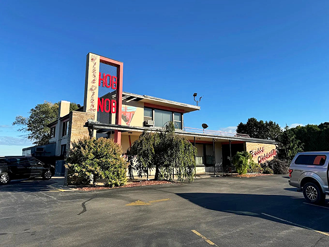 The neon glow of HobNob's sign cuts through the night like a beacon for hungry souls. Wisconsin's supper club tradition lives on in this lakeside gem.