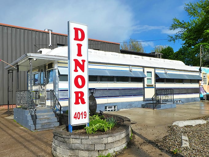 The classic railcar silhouette of Lawrence Park Dinor stands proudly in Erie, where "Dinor" isn't a typo—it's local tradition with a side of history.