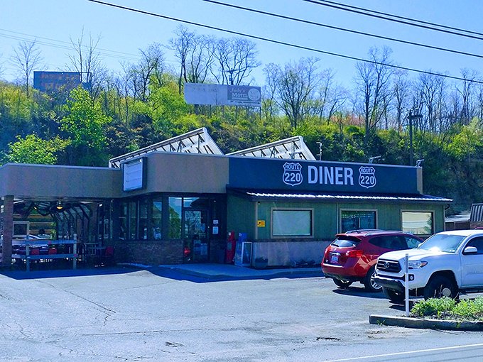 The unassuming exterior of Route 220 Diner stands like a culinary lighthouse on Bedford's roadside, promising comfort food salvation to hungry travelers and locals alike.