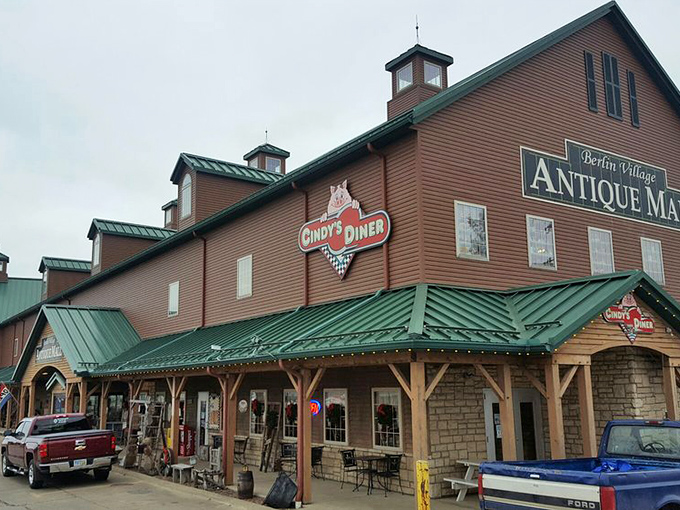 The red barn exterior isn't just eye-catching—it's a siren call to treasure hunters everywhere. Green roof, rustic charm, and promises of vintage wonders await.