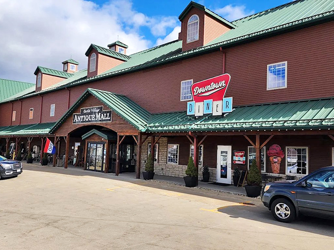 The red barn exterior isn't just eye-catching—it's a siren call to treasure hunters everywhere. Green roof, rustic charm, and promises of vintage wonders await.