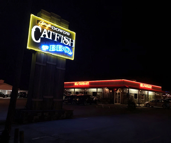 The rustic wooden exterior of Dowd's Catfish House promises no pretension—just the authentic Ozark experience that serious catfish lovers crave.