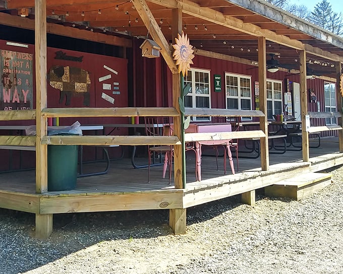 The American flag-inspired roof above Jim's Smokin' Que isn't just patriotic—it's a beacon for BBQ pilgrims. That vintage gas pump promises fuel of a different kind.