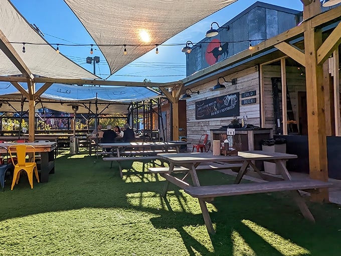 Walter's rustic exterior is like a siren song for BBQ lovers – weathered metal, colorful umbrellas, and picnic tables that practically whisper, "Sit down, stay awhile."