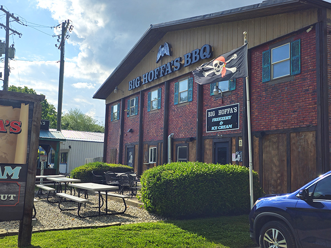 The pirate flag flying proudly above Big Hoffa's brick exterior isn't just decoration—it's a warning that your diet is about to walk the plank.