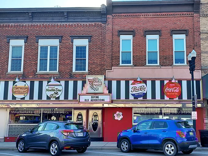 The classic red storefront of Mom's Diner & Pizzeria stands as a beacon of nostalgia on Archbold's main street, complete with vintage Pepsi-Cola and Mountain Dew signage that whispers, "Slow down and stay awhile." 