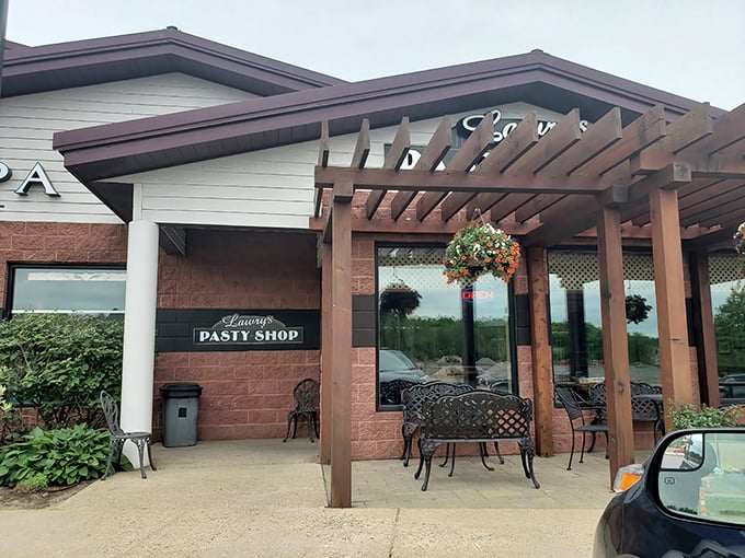 The unassuming exterior of Lawry's Pasty Shop stands like a culinary lighthouse, beckoning hungry travelers with the promise of Upper Peninsula comfort food perfection.