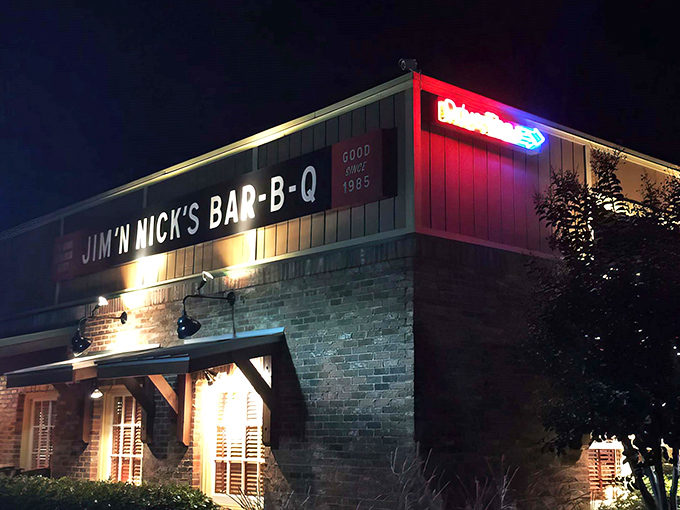 The neon glow of barbecue salvation beckons from Smyrna's night sky, promising smoky redemption for even the most hardened food skeptics.
