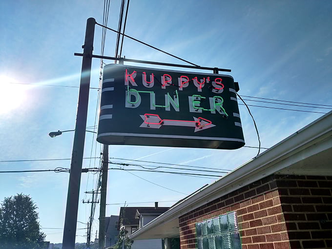 That iconic neon sign isn't just pointing you toward breakfast—it's directing you to a slice of American dining history.