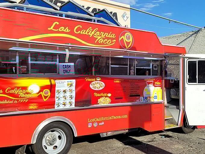 The bright red beacon of Los California Tacos stands proudly outside Nishikawa Auto Service, proving that culinary magic can happen in the most unexpected places.