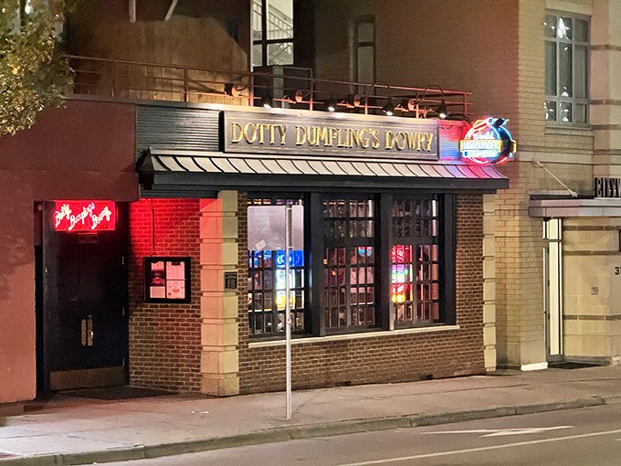 That red neon glow isn't just a sign—it's a beacon calling to burger pilgrims across Madison. The humble brick exterior belies the flavor explosion waiting inside.