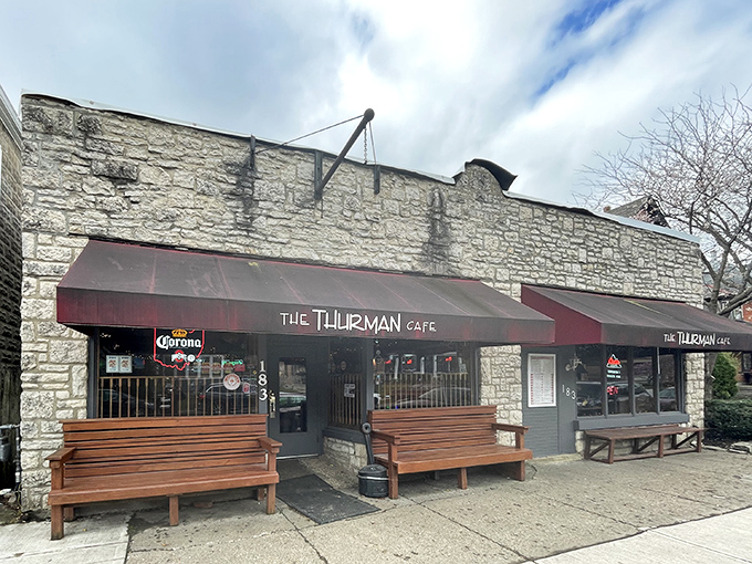 The unassuming stone exterior of The Thurman Cafe hides Columbus' most legendary burger joint. Those wooden benches aren't decorative—they're survival gear for the inevitable wait.